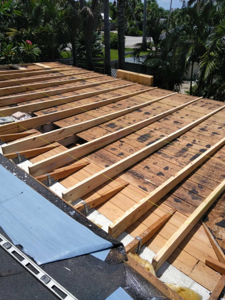 Easily Change Flat Roof To A Pitched Roof using wood rafters